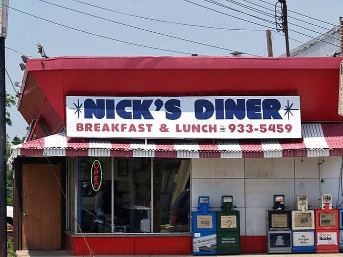 The iconic red exterior of Nick's Diner stands as a beacon of breakfast hope on Wheaton's landscape, promising comfort food that never disappoints.