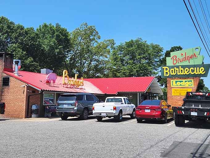 That vintage neon sign isn't just advertising, it's a beacon calling barbecue lovers home since the Truman administration.