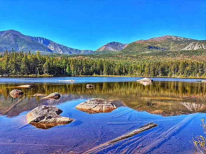 Crystal clear waters and mountain reflections create nature's own high-definition postcard. No subscription required for this premium view.