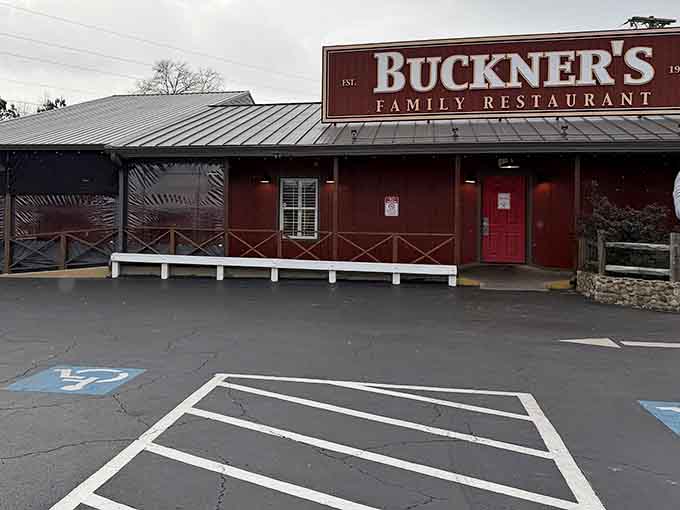 The welcoming red doors and charming exterior tell you everything you need to know about Southern hospitality done right.