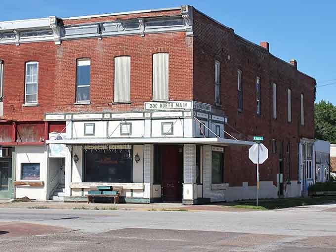 Classic small-town storefronts where the architecture tells stories and the awnings provide actual shade instead of ironic ambiance.
