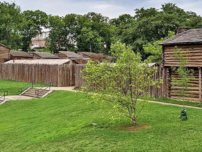 A peaceful corner of the reconstructed fort showcases the rustic architecture that sheltered Kentucky's pioneers, who definitely never complained about slow internet.