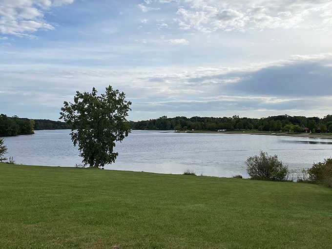 Lush green lawns meet crystal waters at Seven Lakes, offering peaceful picnic spots with nature's perfect backdrop.