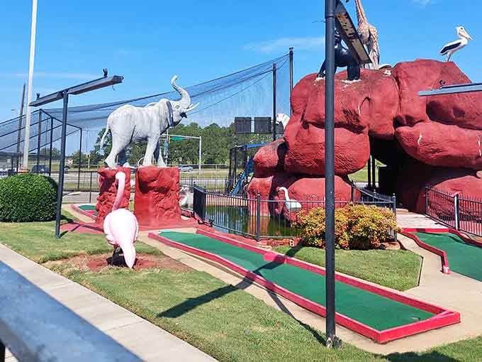 Those oversized animal sculptures aren't just decoration, they're your competition on this wonderfully quirky mini golf adventure.