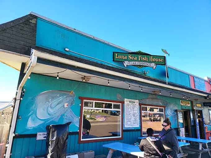 That turquoise exterior isn't just paint, it's a promise of the seafood treasures waiting inside.