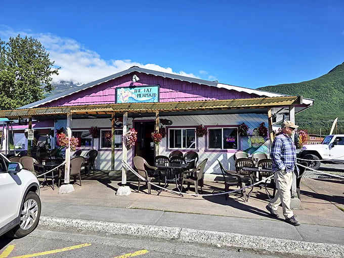Mountains frame this unassuming culinary gem like nature's own dining room, where seafood tastes fresher beneath Alaska's watchful peaks.