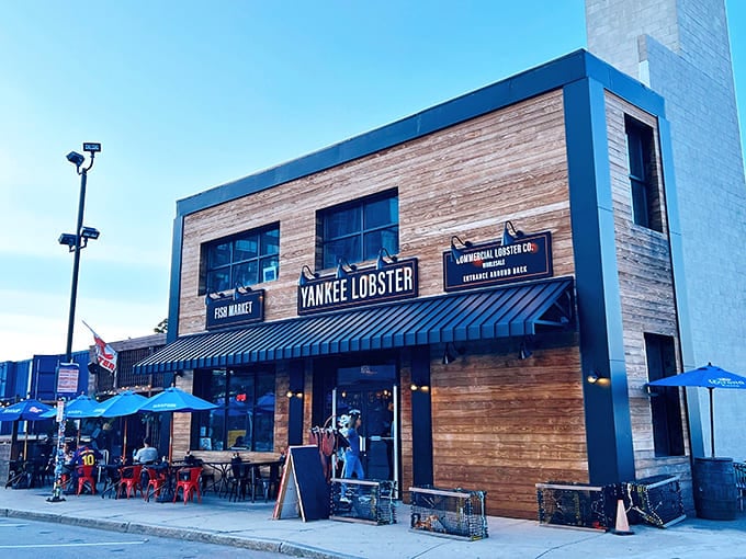 That classic blue awning is like a lighthouse beacon for chowder enthusiasts navigating Boston's Seaport District.