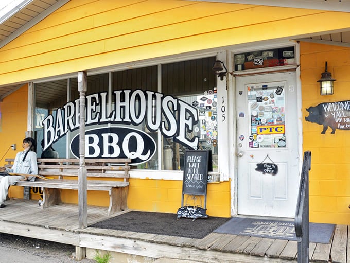 The sunshine-yellow exterior of Barrel House BBQ stands like a beacon of hope for hungry travelers &ndash; proof that culinary treasures often hide in the most unassuming packages.