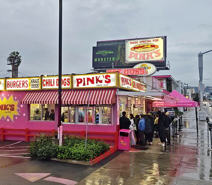 Even the rain can't dampen the spirits of people willing to wait for these legendary hot dogs.