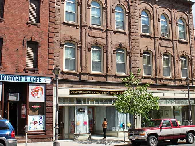 Every storefront tells a story here, and the architecture provides plot twists you won't find in suburban strip malls.