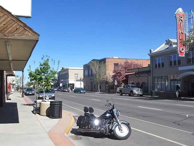 The Rialto Theater's vintage sign towers over a downtown where entertainment doesn't require taking out a second mortgage.