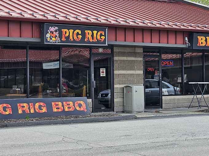 The glowing Pig Rig BBQ sign beckons like a smoky lighthouse for the hungry and barbecue-deprived souls of Connecticut.