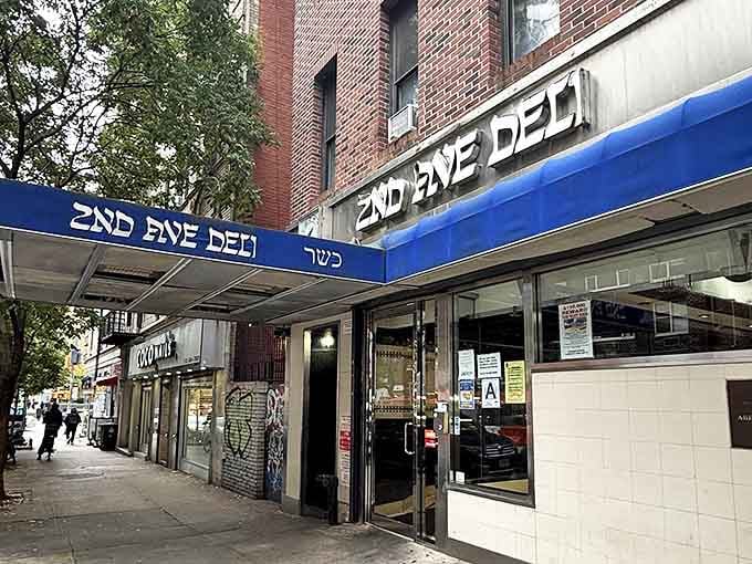 The Hebrew lettering proudly announces "kosher" &ndash; a promise that what awaits inside follows traditions older than most Manhattan buildings.