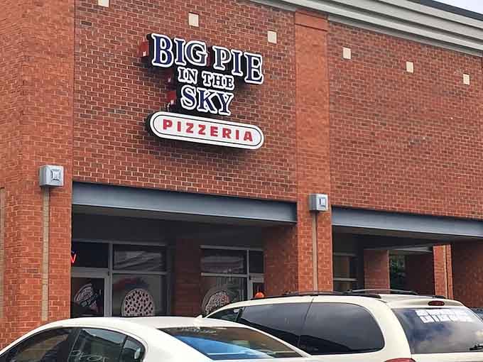 When the building itself announces "Big Pie," you know they're not serving dainty personal pizzas from fancy ovens.