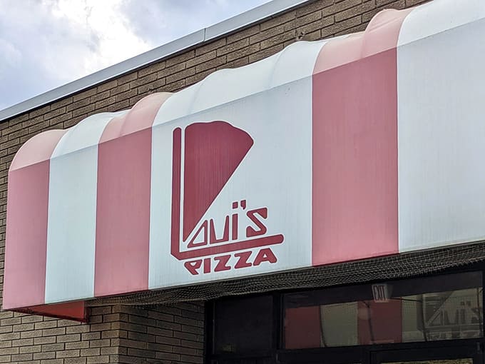 That pink and white striped awning isn't trying to be retro, it just never left the party.