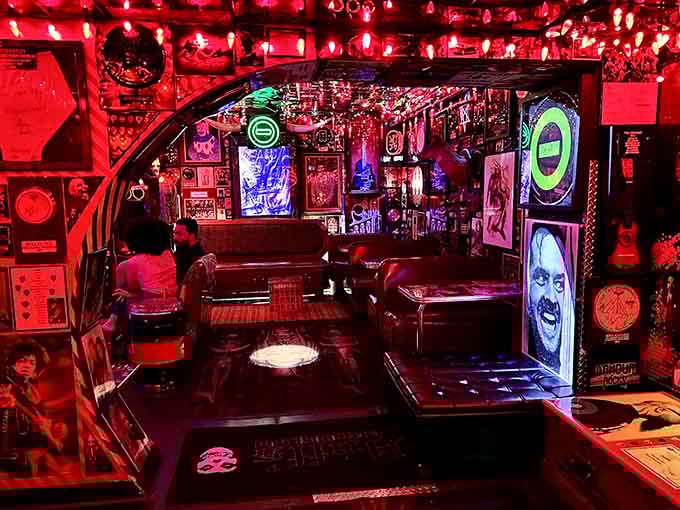 Every surface screams for attention in this crimson wonderland where pop culture goes to party.