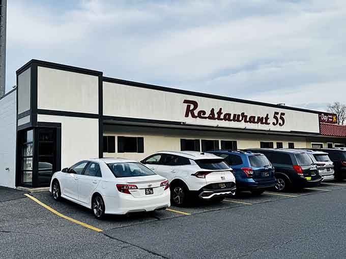 The unassuming exterior of Restaurant 55 proves the old adage: never judge a culinary treasure by its strip mall location. Delaware's worst-kept secret awaits inside.