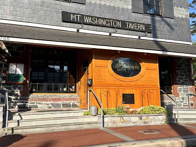 That wooden doorway isn't just an entrance—it's a portal to oyster nirvana. The tavern's iconic façade combines stone, brick, and wood in a Baltimore architectural love letter.