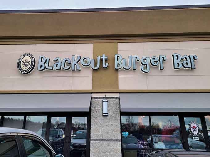The unassuming exterior of Blackout Burger Bar hides culinary treasures within, like finding a diamond mine disguised as a hardware store.