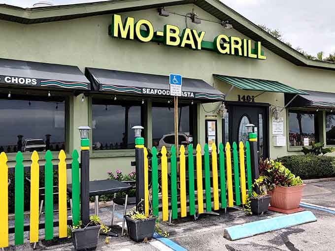 That cheerful yellow sign isn't just welcoming you in, it's practically begging you to discover Sebastian's Caribbean secret.