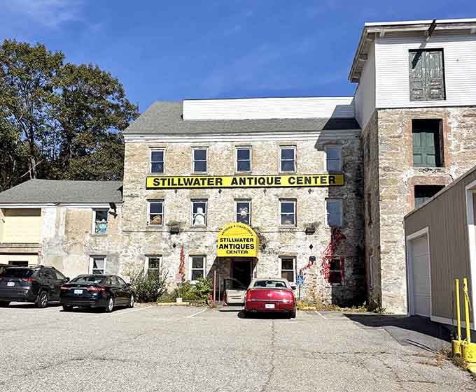 The historic stone building housing Stillwater Antique Center stands proudly in Greenville, its weathered exterior hiding countless treasures within.
