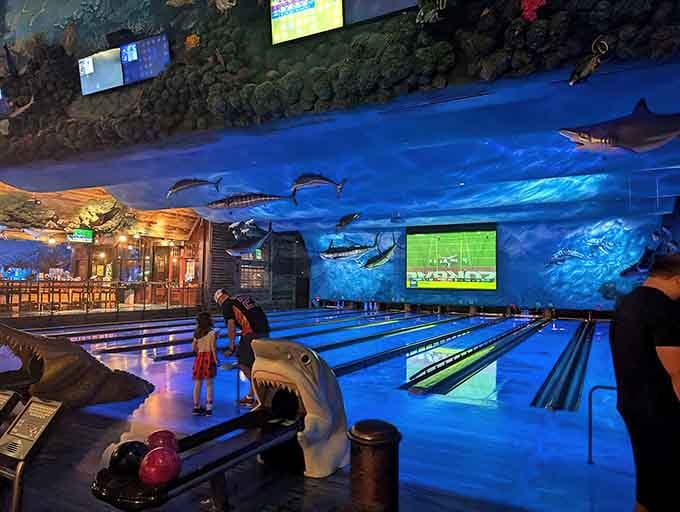 Those underwater projections aren't just decoration&mdash;they're your bowling companions, silently judging your technique from the deep.