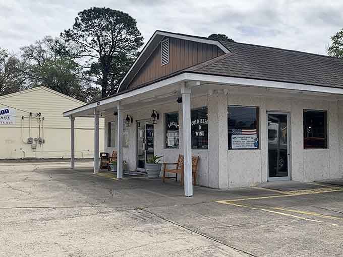 Simple wooden benches welcome hungry visitors to this local favorite, where authentic coastal flavors outshine the humble surroundings.