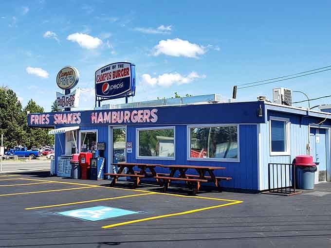 That brilliant blue exterior isn't just a building—it's a beacon calling hungry travelers home to burger paradise.