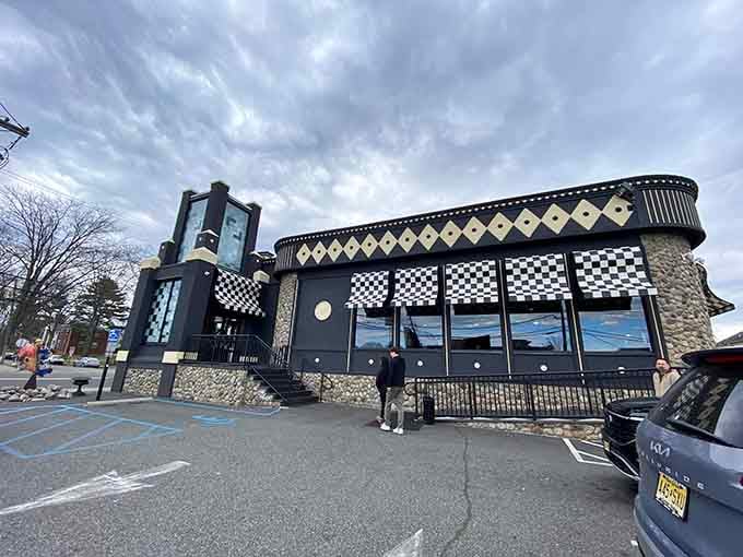 That checkerboard exterior isn't just decoration, it's a promise that something wonderfully weird awaits inside.