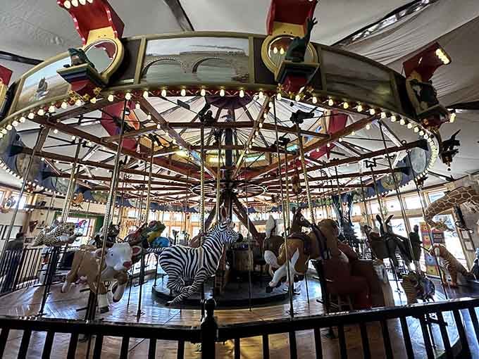 Hand-carved creatures circle endlessly in this Nederland treasure, where artistry meets pure childhood wonder in wooden form.