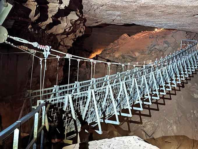 The world's longest underground swinging bridge stretches across Hidden River Cave like something from an adventure movie you'd actually want to star in.