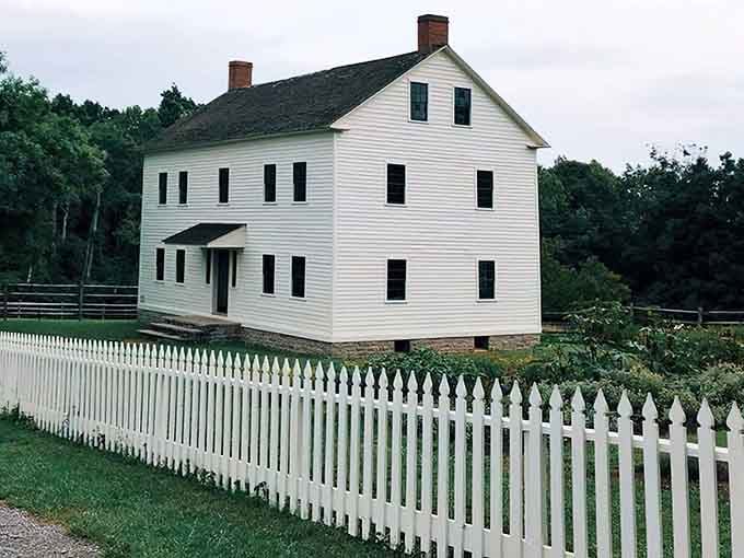 Stroll past the crisp white pickets of this classic homestead, just one of many stories waiting for you in Mumford.