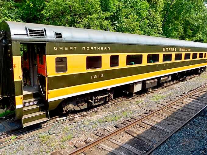 The Great Northern Empire Builder cars gleam in vintage yellow and green, ready to transport you back to when travel meant something.