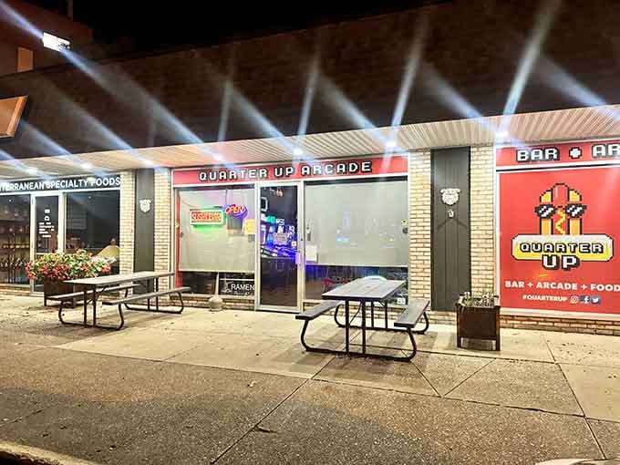 Evening at Quarter Up looks like a pixel art dream come to life in strip mall form.