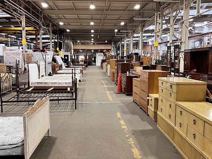 Those yellow tape lines on the floor aren't just for show—they're your roadmap through furniture paradise.