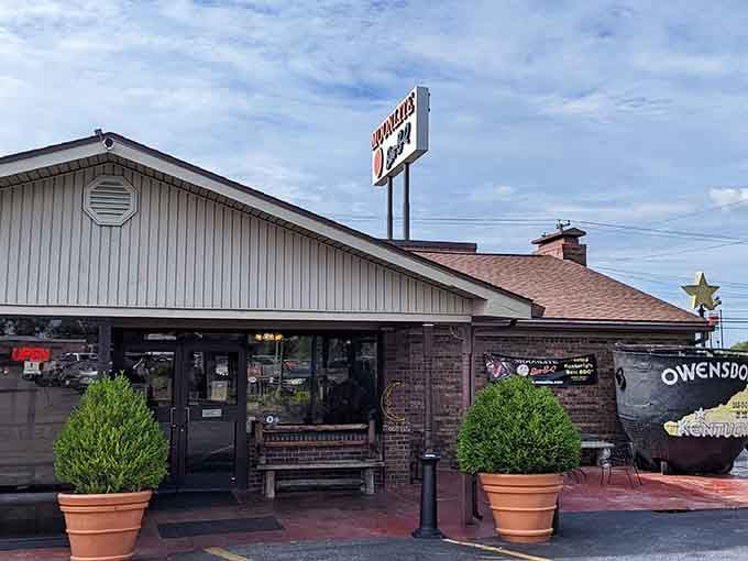 That iconic sign isn't just pointing you toward barbecue, it's pointing you toward enlightenment wrapped in smoke.