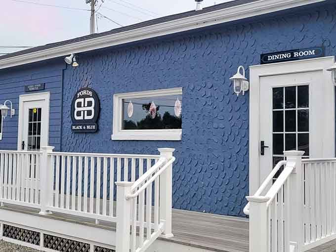 That blue exterior isn't just pretty, it's a beacon calling you to lobster paradise in Groton.