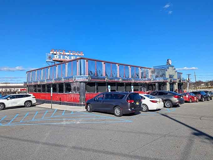 Classic diner design meets modern appetite, where every parking spot represents someone's upcoming food happiness.