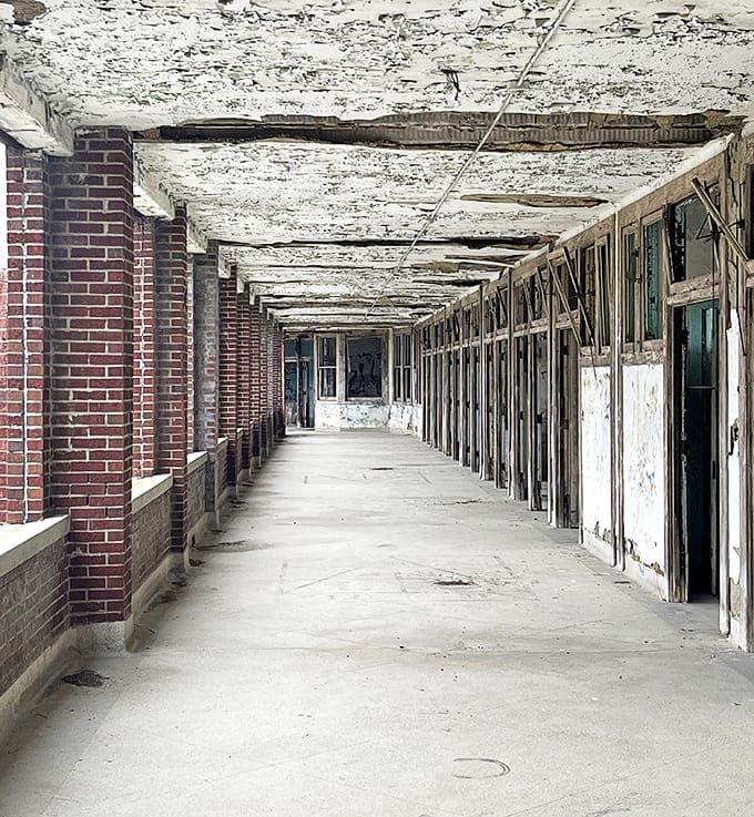 These open-air porches once offered fresh air therapy to tuberculosis patients, a treatment that sounds quaint until you remember it barely worked.