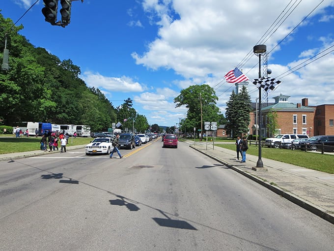 The checkered flag tells you everything: this town takes its racing heritage seriously, even on the quietest days.