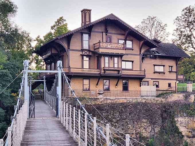 When your commute involves crossing a swaying bridge to reach a fairytale cottage, you're officially winning at life.