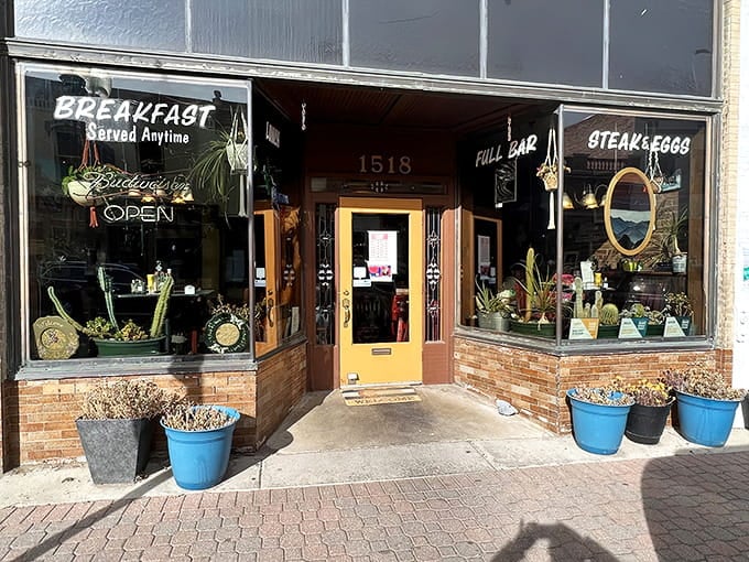 This unassuming facade on Main Street has been quietly feeding locals the kind of breakfast that makes tourists wish they were locals.