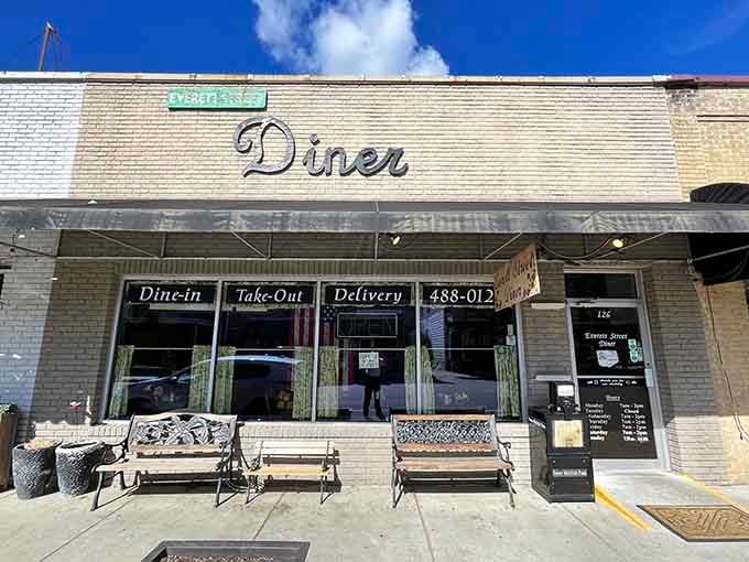 Those benches out front aren't just decoration; they're where locals wait patiently for their turn at breakfast heaven.