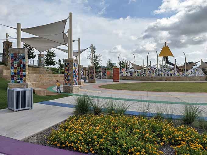 Shade sails and thoughtful landscaping prove that playgrounds can be beautiful spaces, not just functional ones for tired parents.