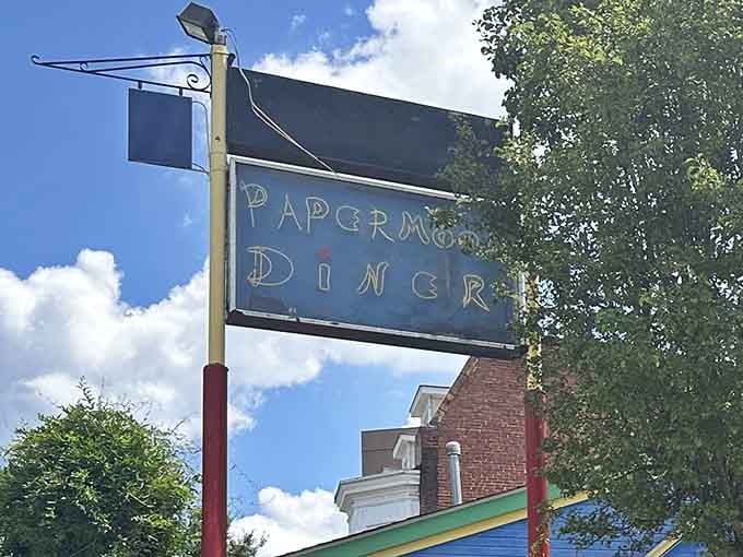 Even the street sign looks like it's been dipped in whimsy and left to dry in the Baltimore sun.