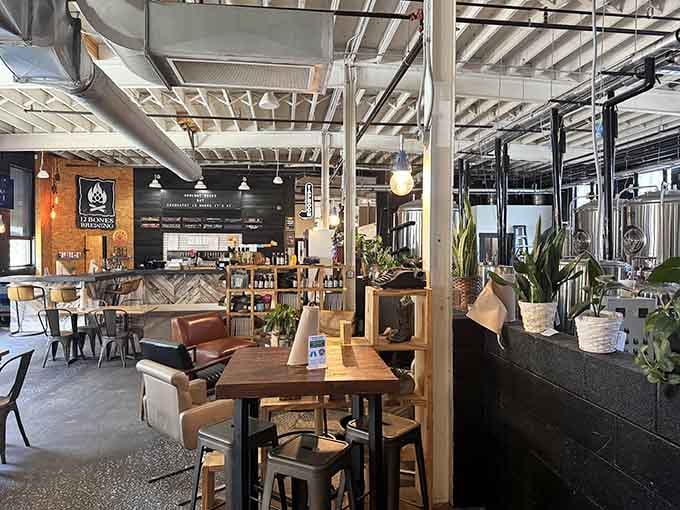 Industrial meets cozy in a space that proves you can have exposed ductwork and still feel completely at home.