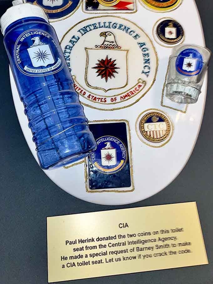 The CIA gets the toilet seat treatment, complete with a cheeky request about cracking the code.