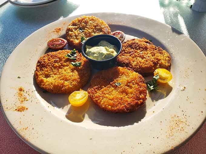 Fried green tomatoes so perfectly crispy they'd make any Southern grandmother nod approvingly from across the Mason-Dixon line.