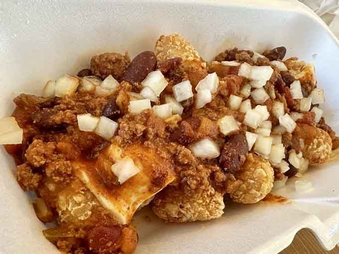 Chili spuds topped with all the fixings transform humble tater tots into a hearty meal worth celebrating.