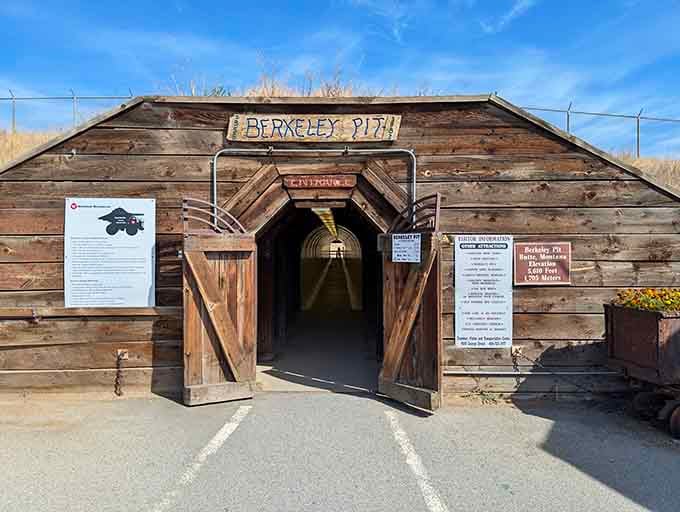 The Berkeley Pit entrance leads to Butte's most unusual attraction. What began as environmental disaster has become a surreal tourist draw with striking turquoise waters.